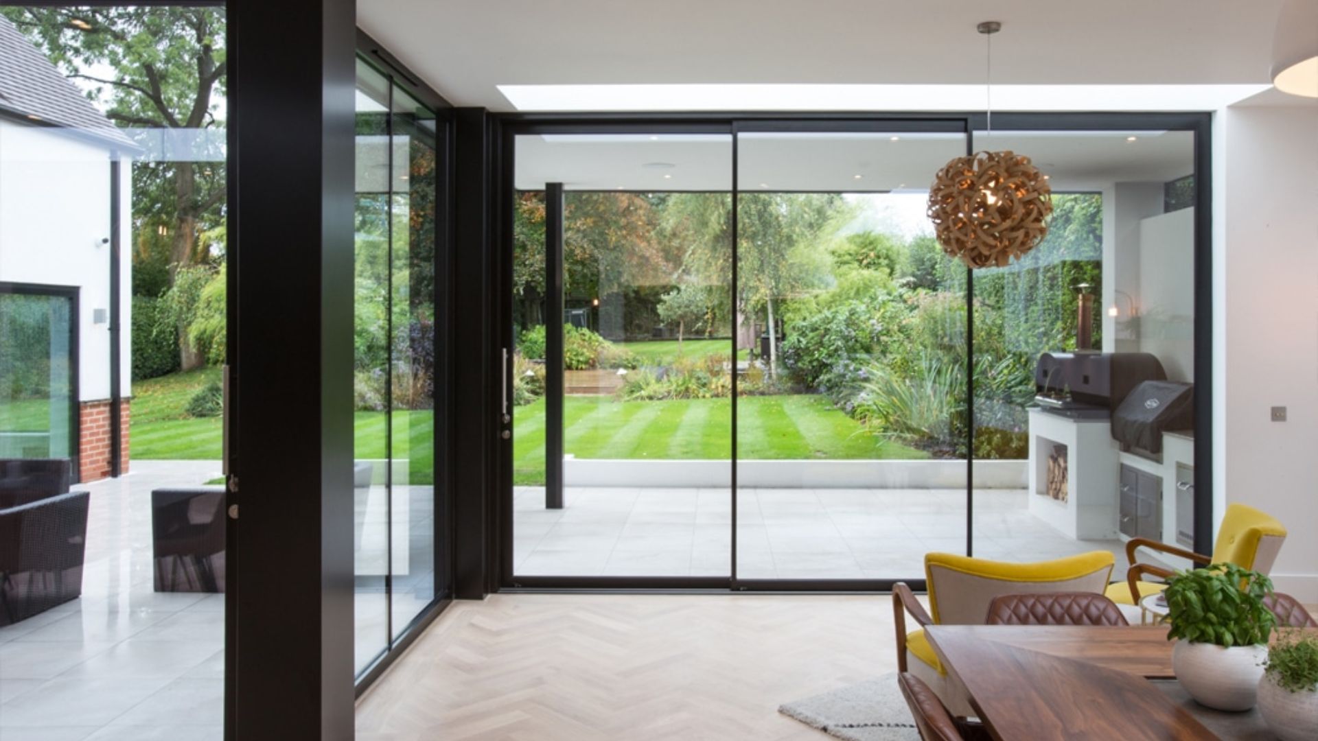 What Are the Benefits of Installing Slim Sliding Doors in Your Living Room?